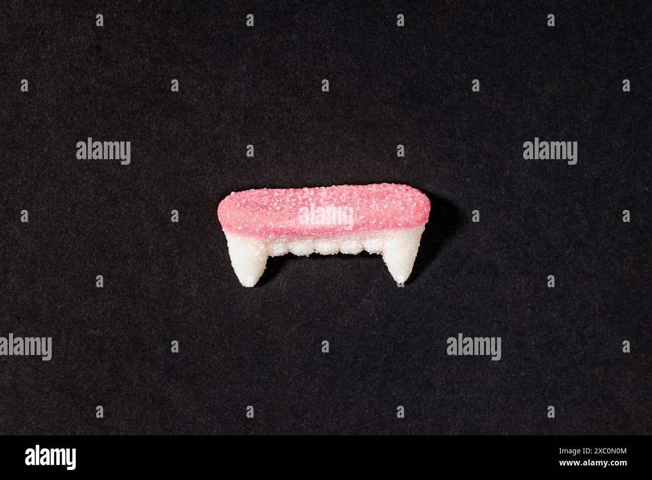 Gummy vampire teeth candies isolated on black background, Halloween ...