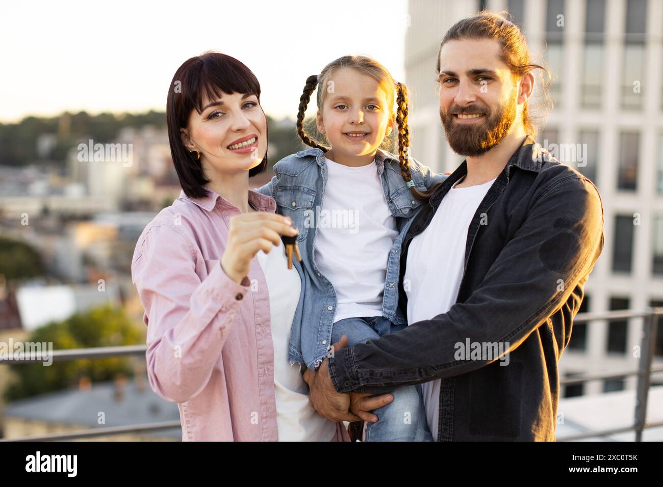 Girl holding keys parents hi-res stock photography and images - Alamy