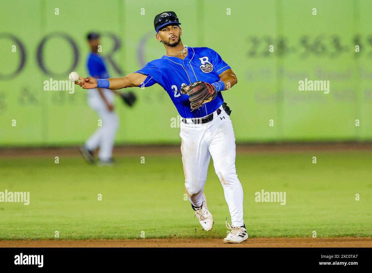 June 13, 2024: Biloxi Shuckers infielder Eric Brown Jr. (20) throws to ...