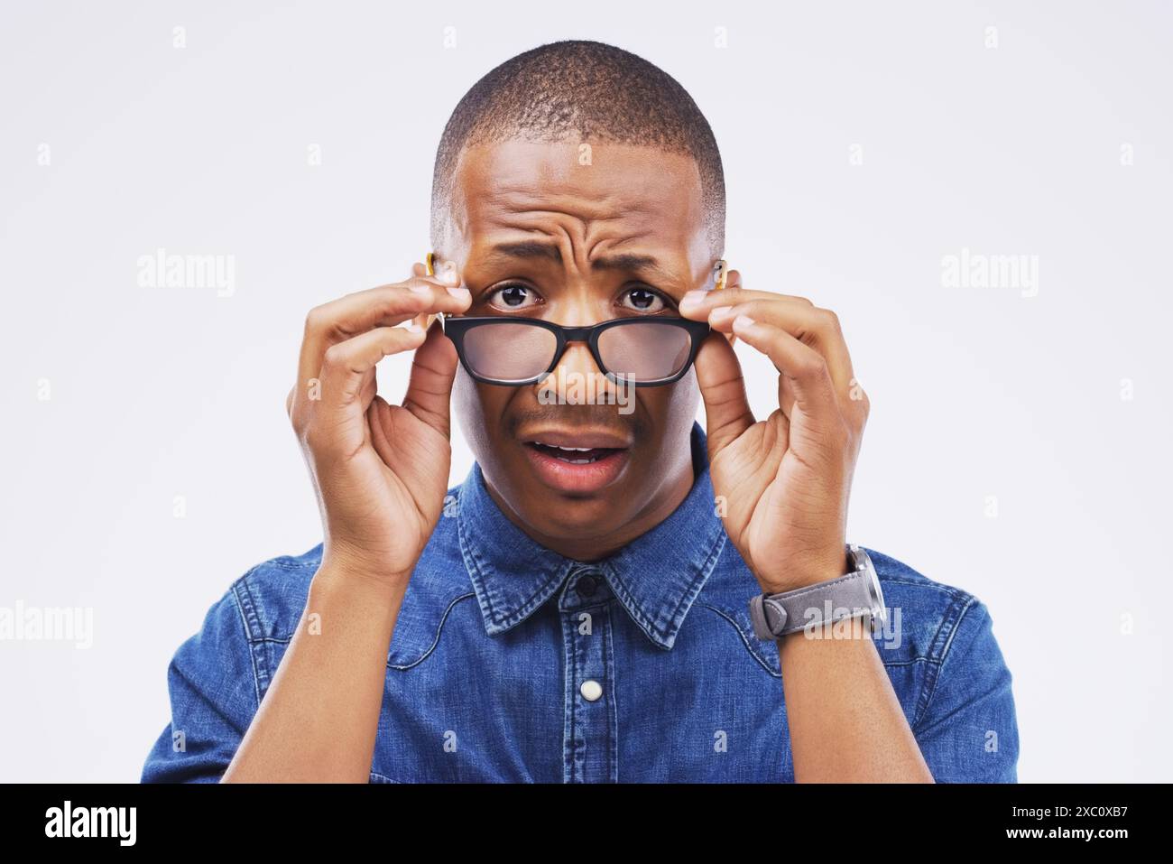 Man in glasses confused scared hi-res stock photography and images - Alamy