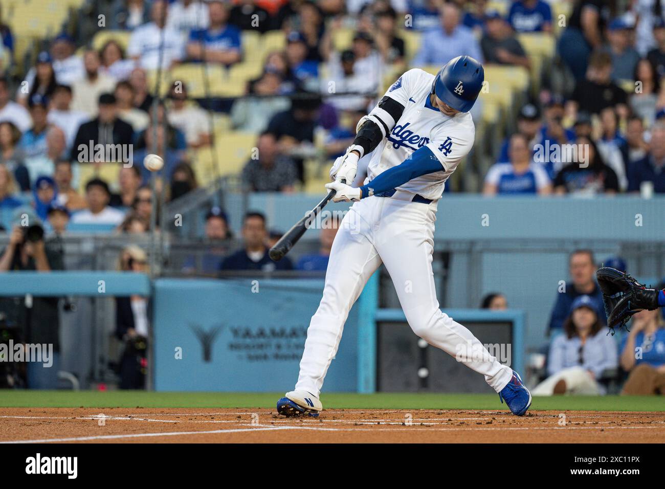 Los Angeles Dodgers designated hitter Shohei Ohtani (17) homers during a MLB game against the ...