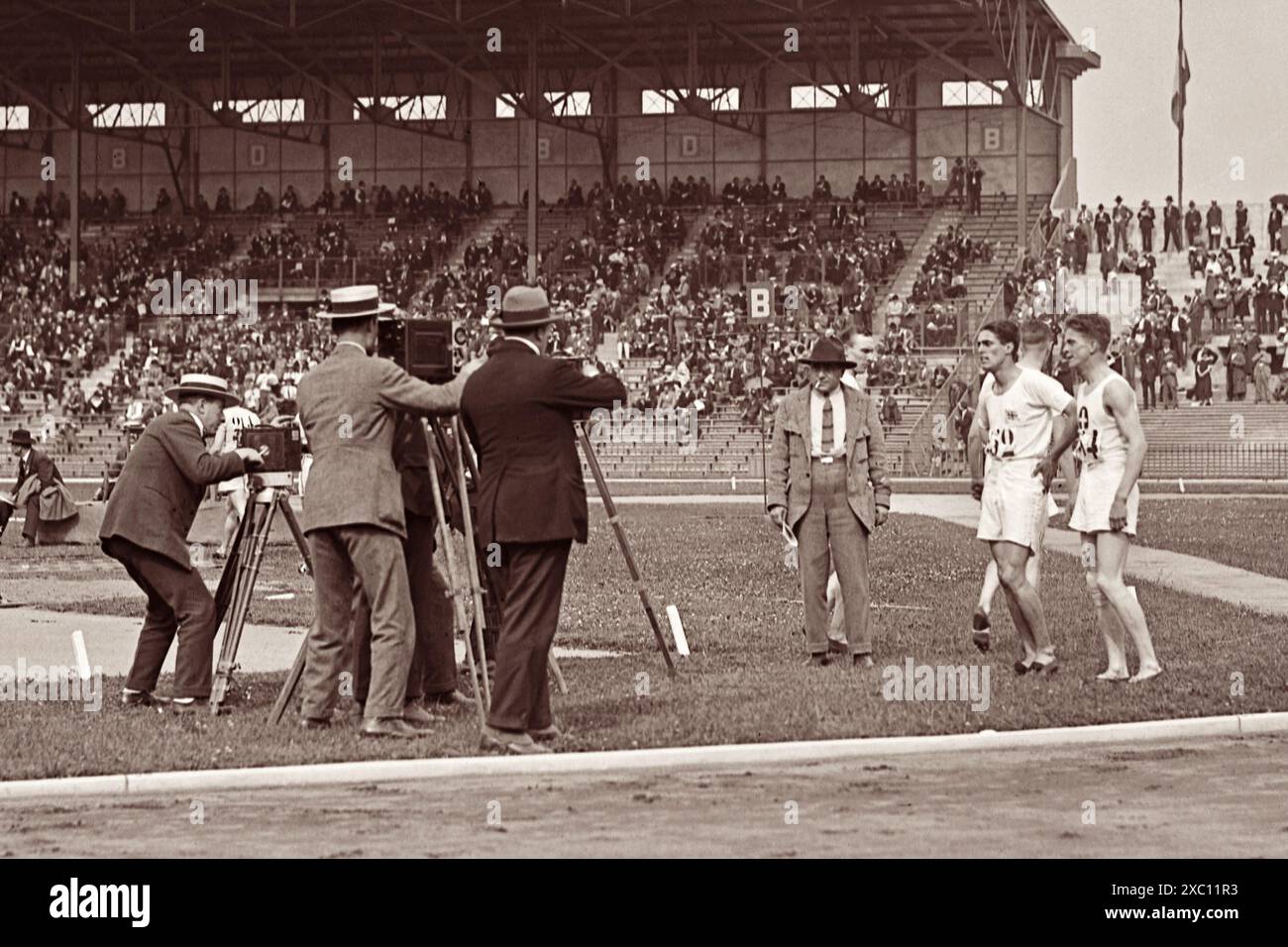 Photographers at the 1924 Paris Olympics making photographs of the Gold ...