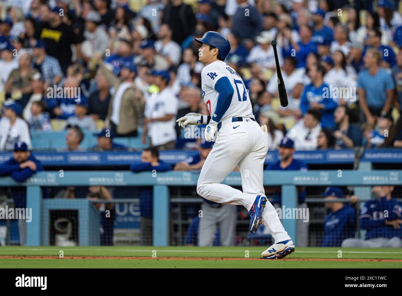 Los Angeles Dodgers designated hitter Shohei Ohtani (17) homers during a MLB game against the ...