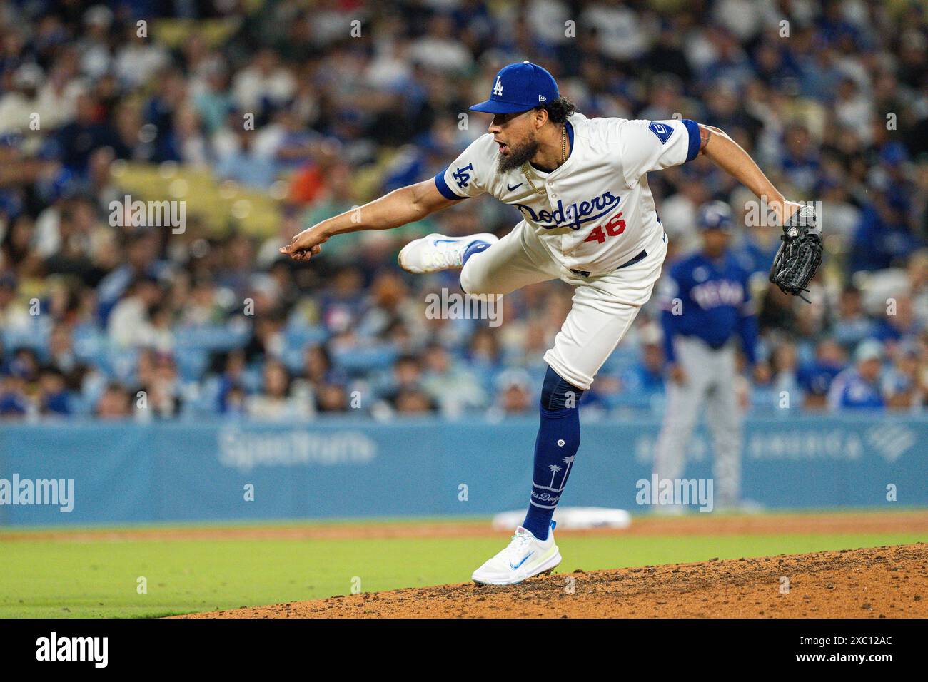 Los Angeles Dodgers pitcher Yohan Ramírez (46) throws during a MLB game ...