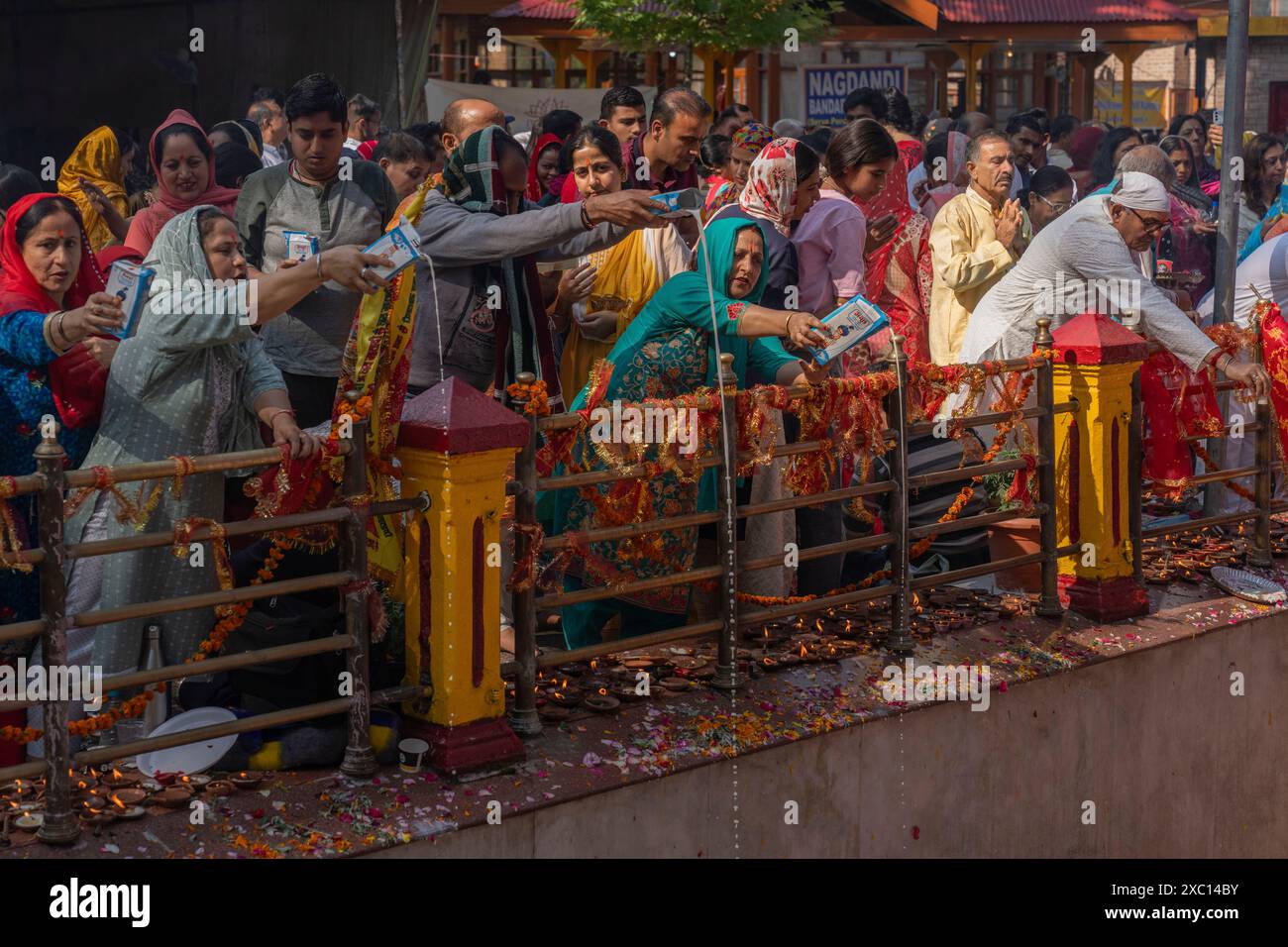 Hindu devotees pray during the annual festival at the Kheer Bhawani ...
