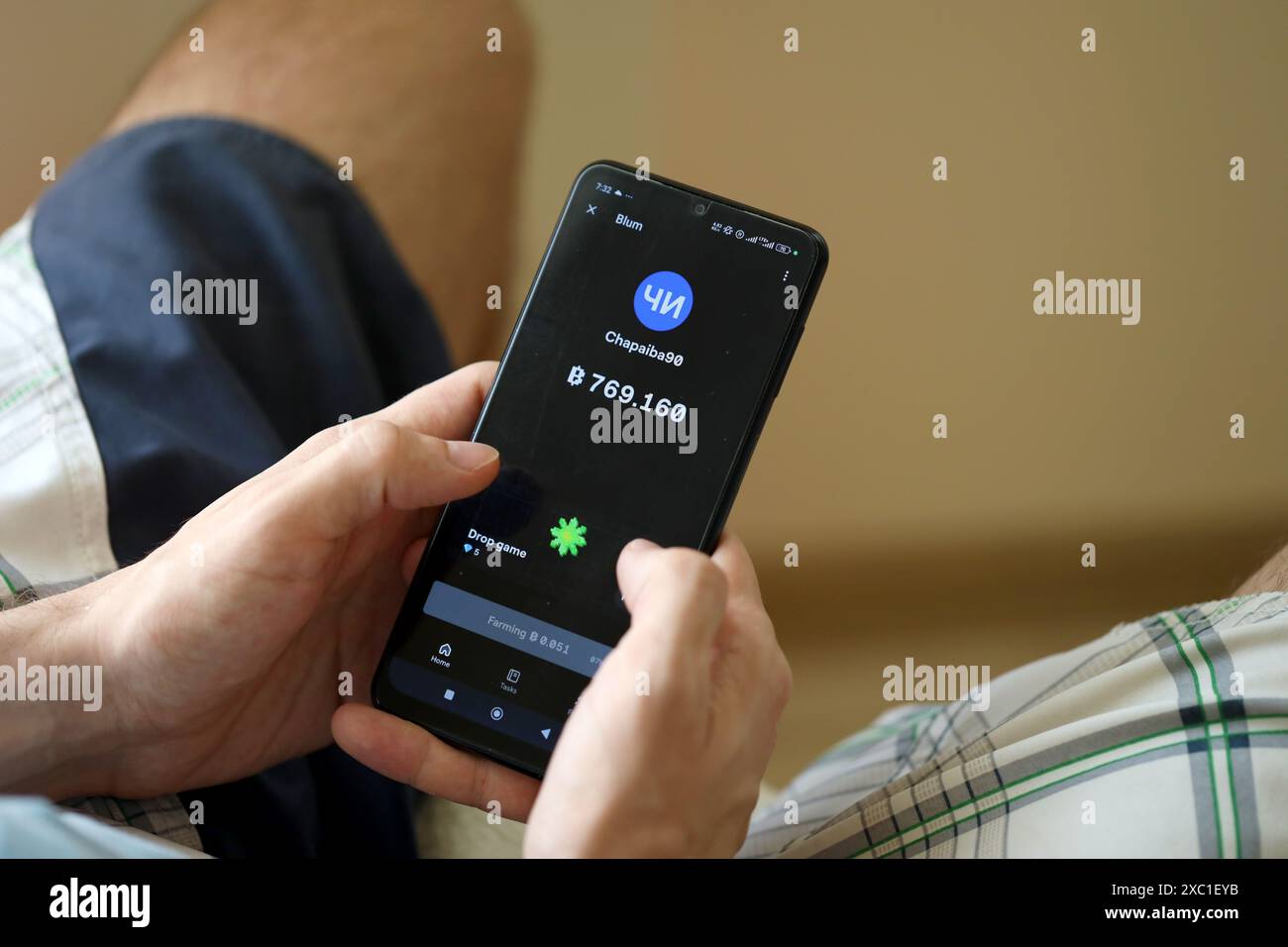 KYIV, UKRAINE - APRIL 20, 2024 Blum telegram bot on smartphone screen ...