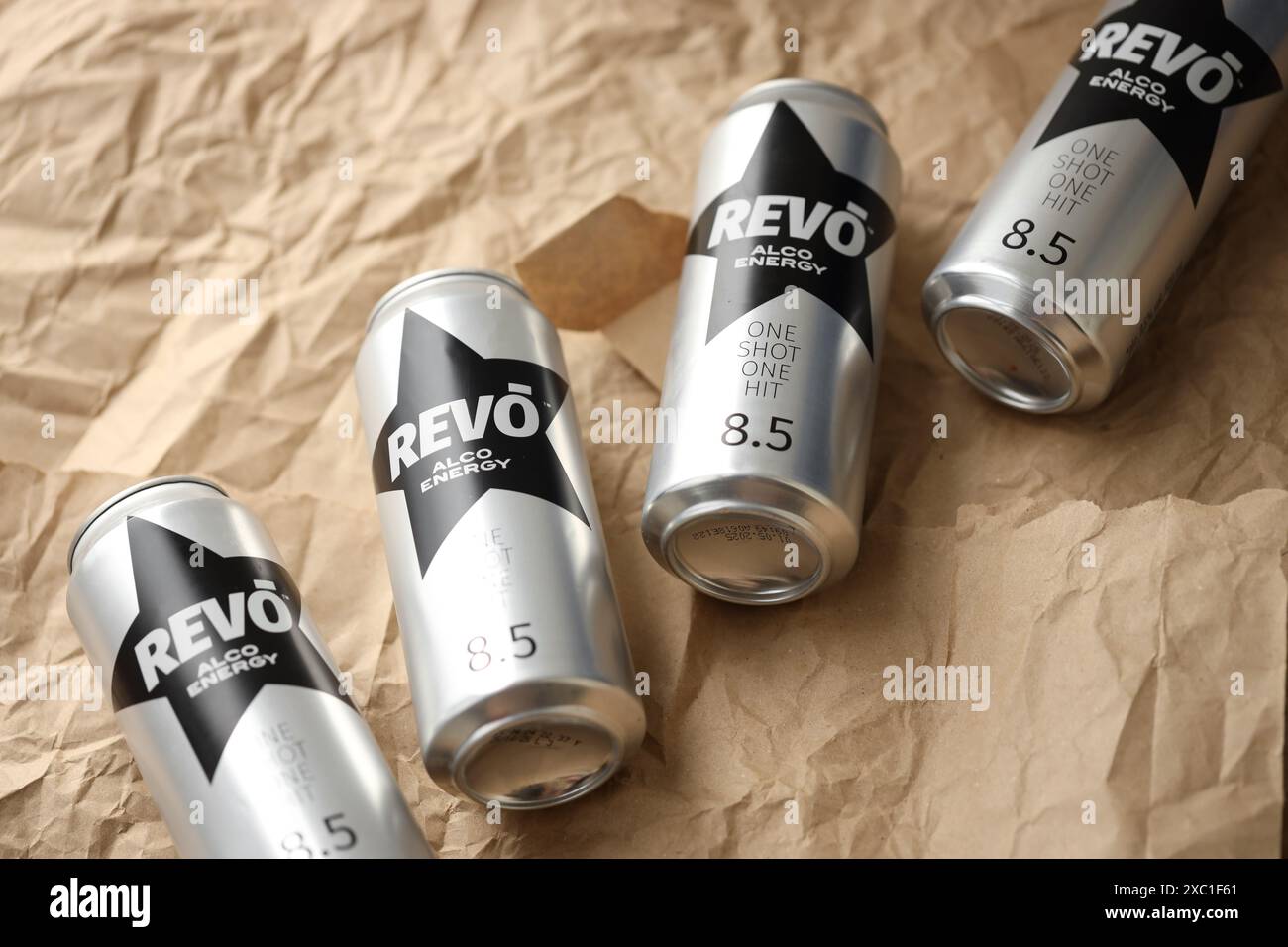 KYIV, UKRAINE - APRIL 20, 2024 Cans of Revo alco energy drink in new ...