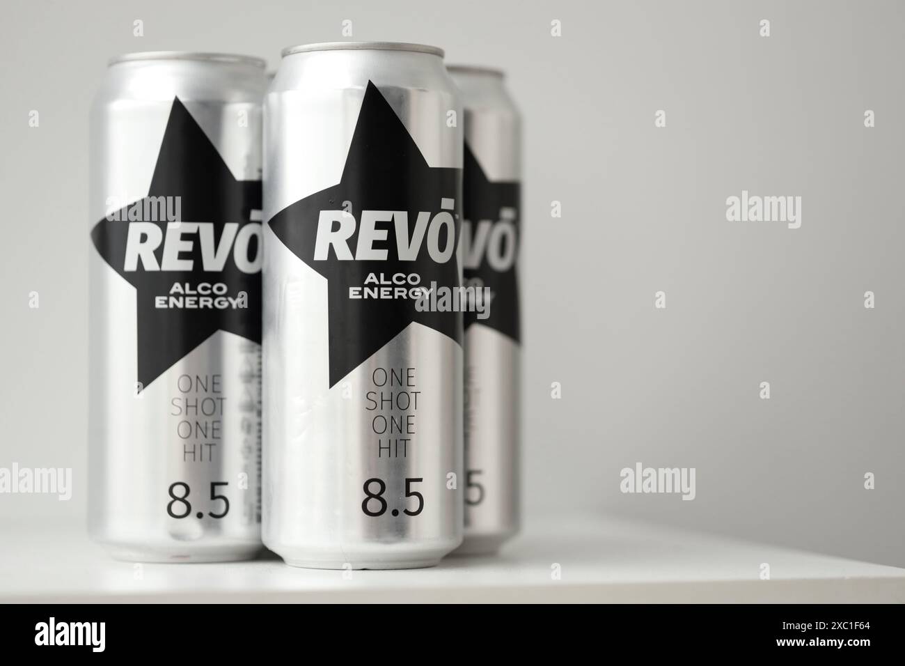 KYIV, UKRAINE - APRIL 20, 2024 Cans of Revo alco energy drink in new ...
