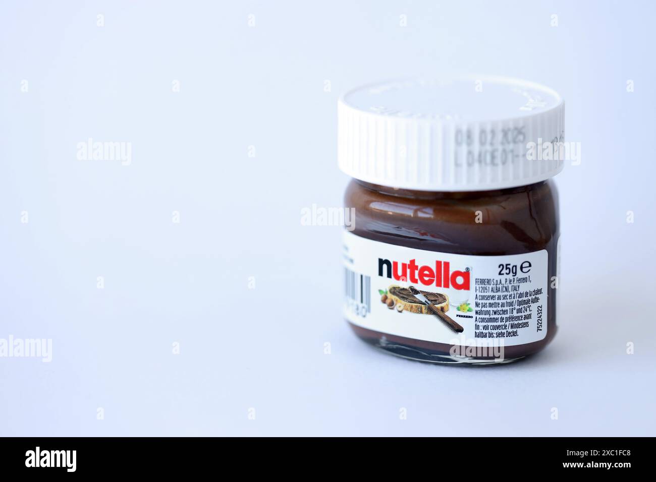 KYIV, UKRAINE - APRIL 20, 2024 Mini Nutella 25g jar on a white ...