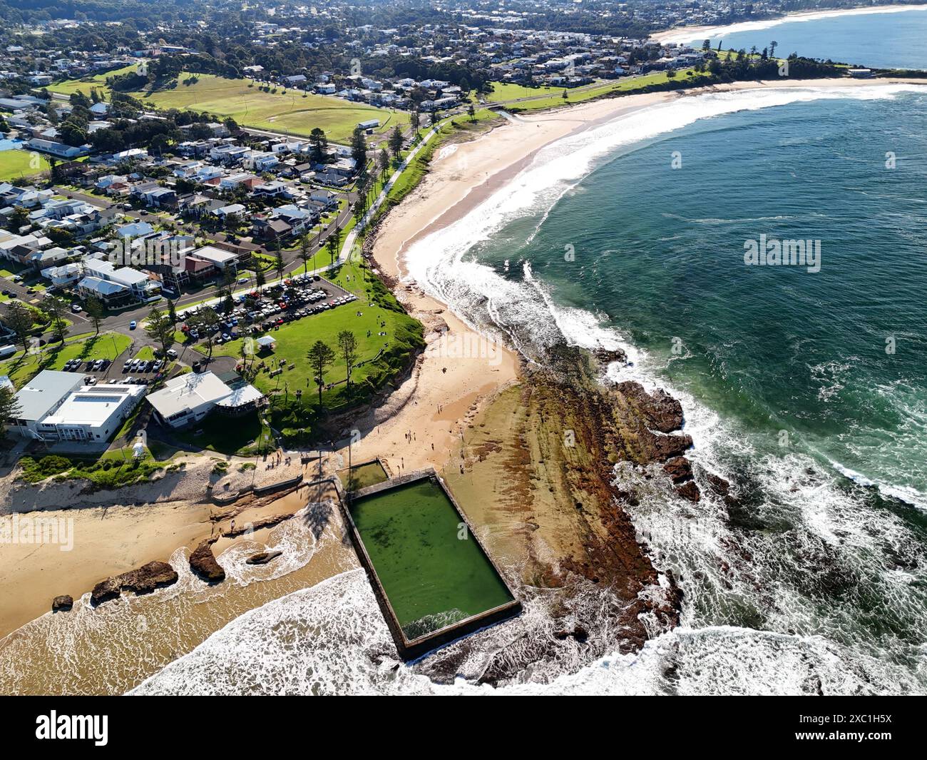 An aerial view of a coastal rock pool and beach in Austinmer, New South ...
