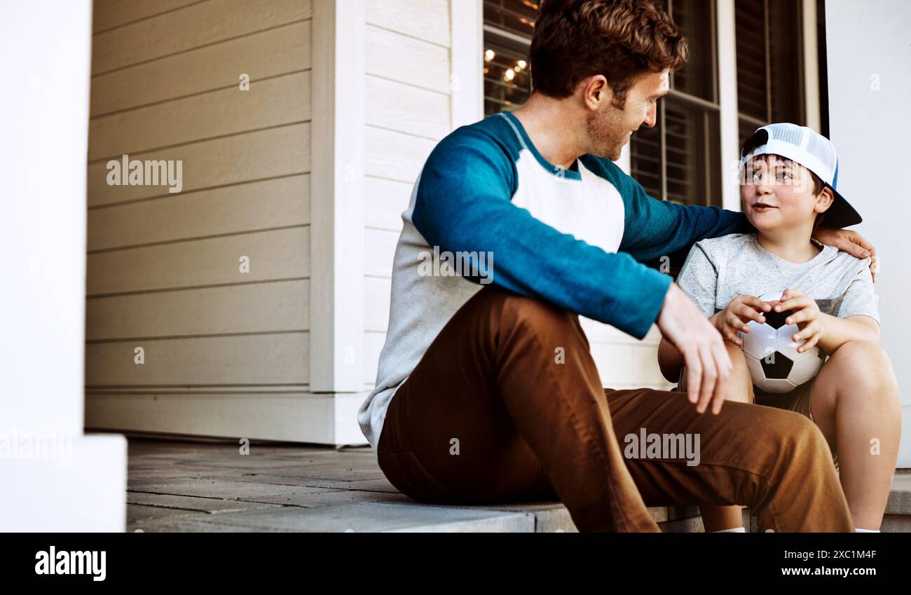 Happy, ball and father hug child on porch ready for playing soccer ...