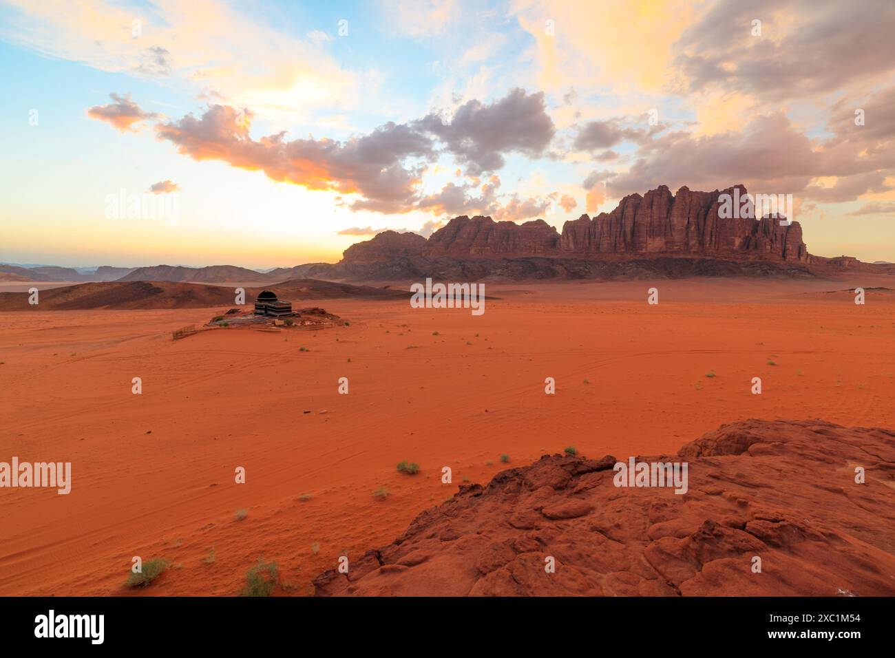 Breathtaking sunset paints the sky with pastels over Jabal Al Qattar ...