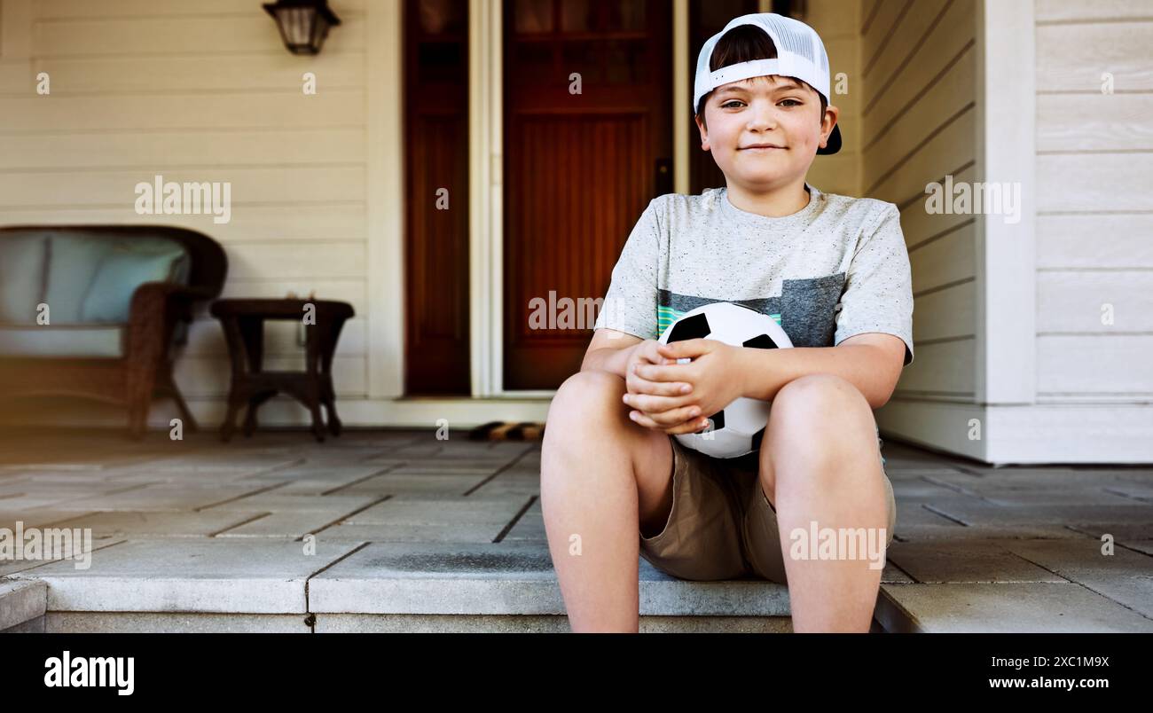 Children, portrait and boy or outdoor with soccer ball for summer fun ...