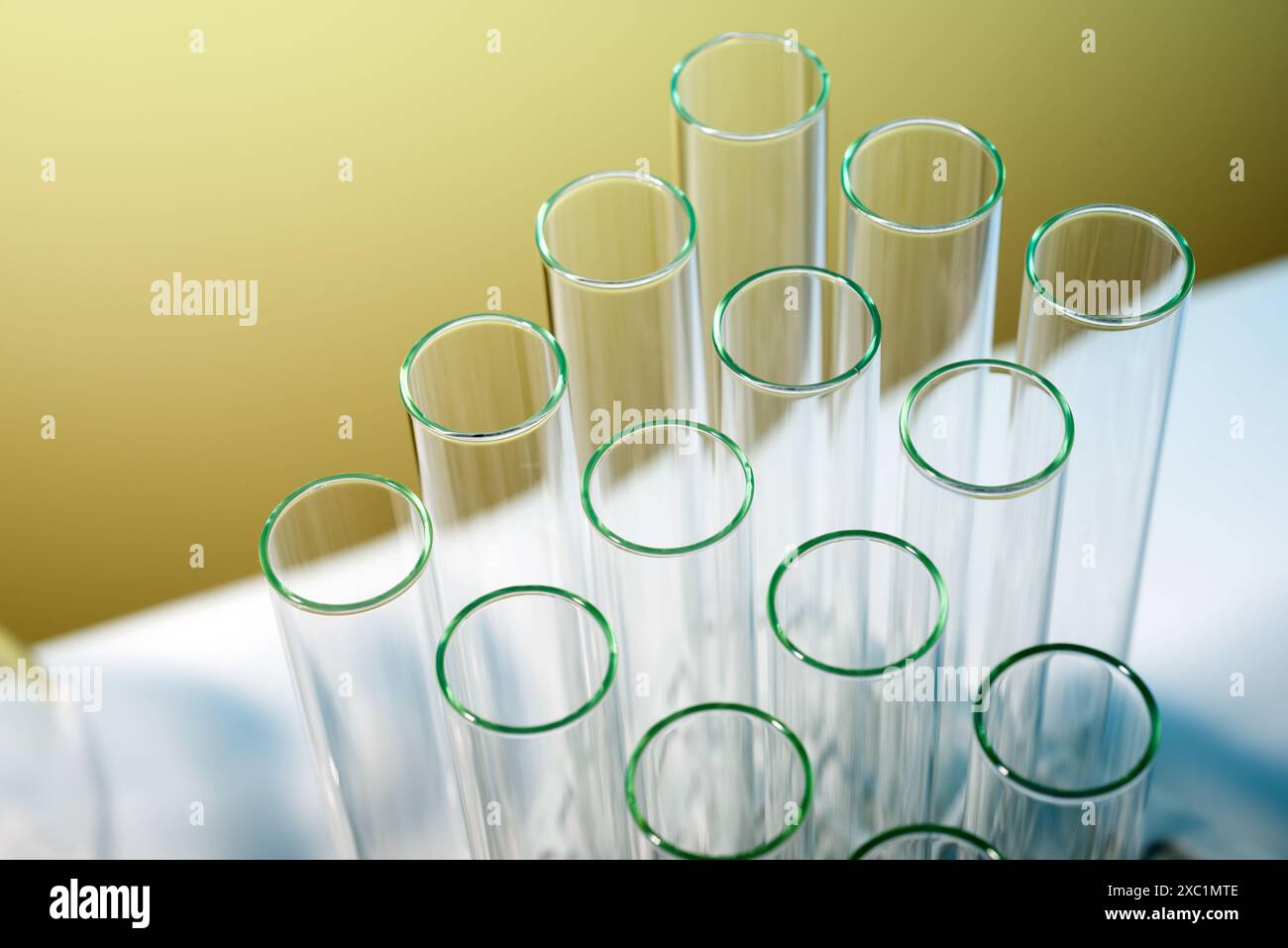 Close up of a group of empty glass test tubes standing in a laboratory ...
