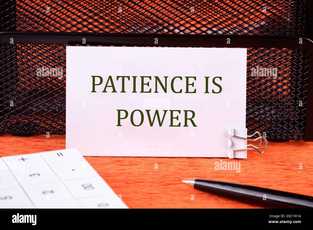 Personal development concept. Words PATIENCE IS POWER on the business ...