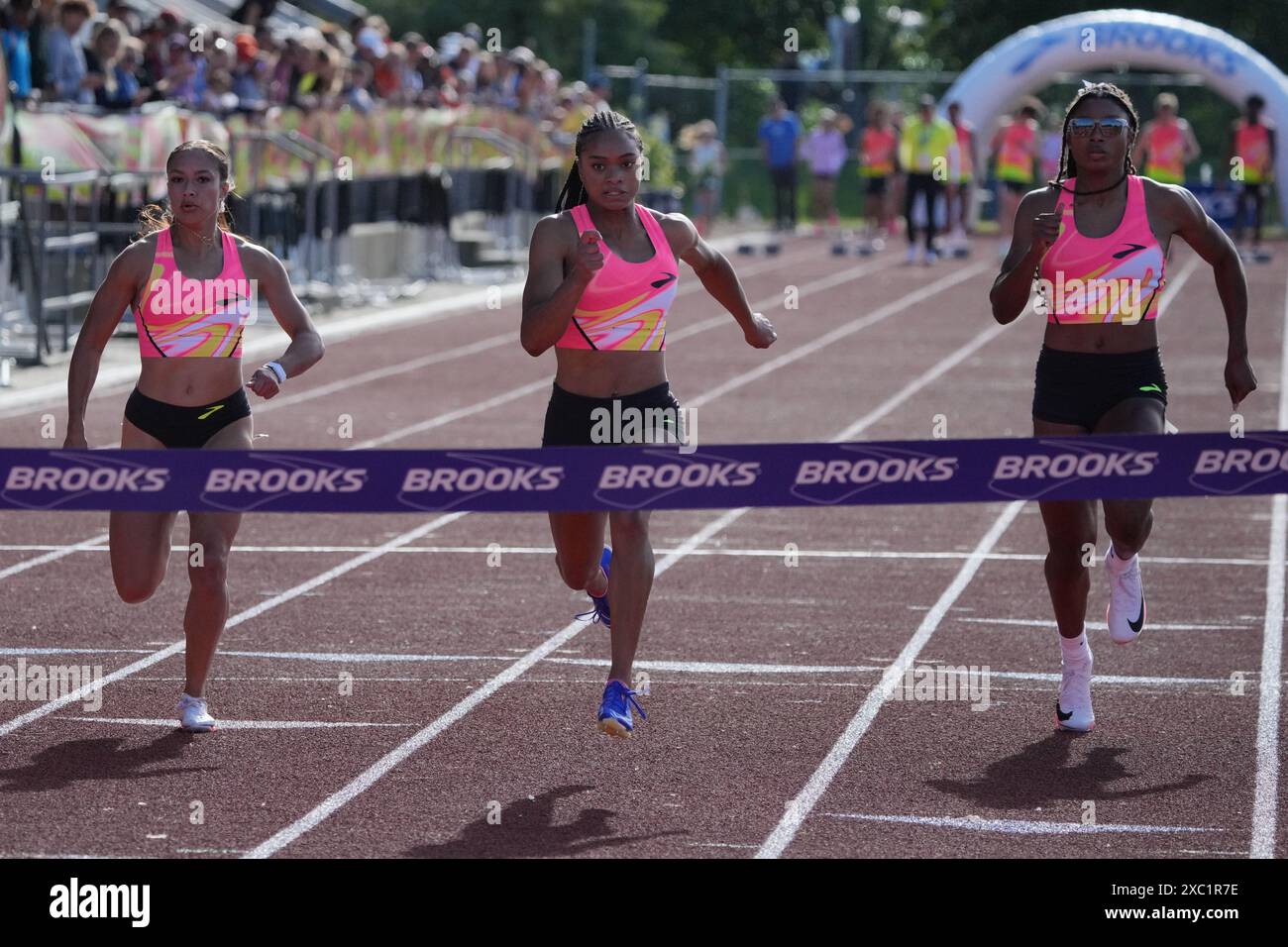 Dana Wilson (center) defeats Keelan Wright (right) and Olivia Pace ...