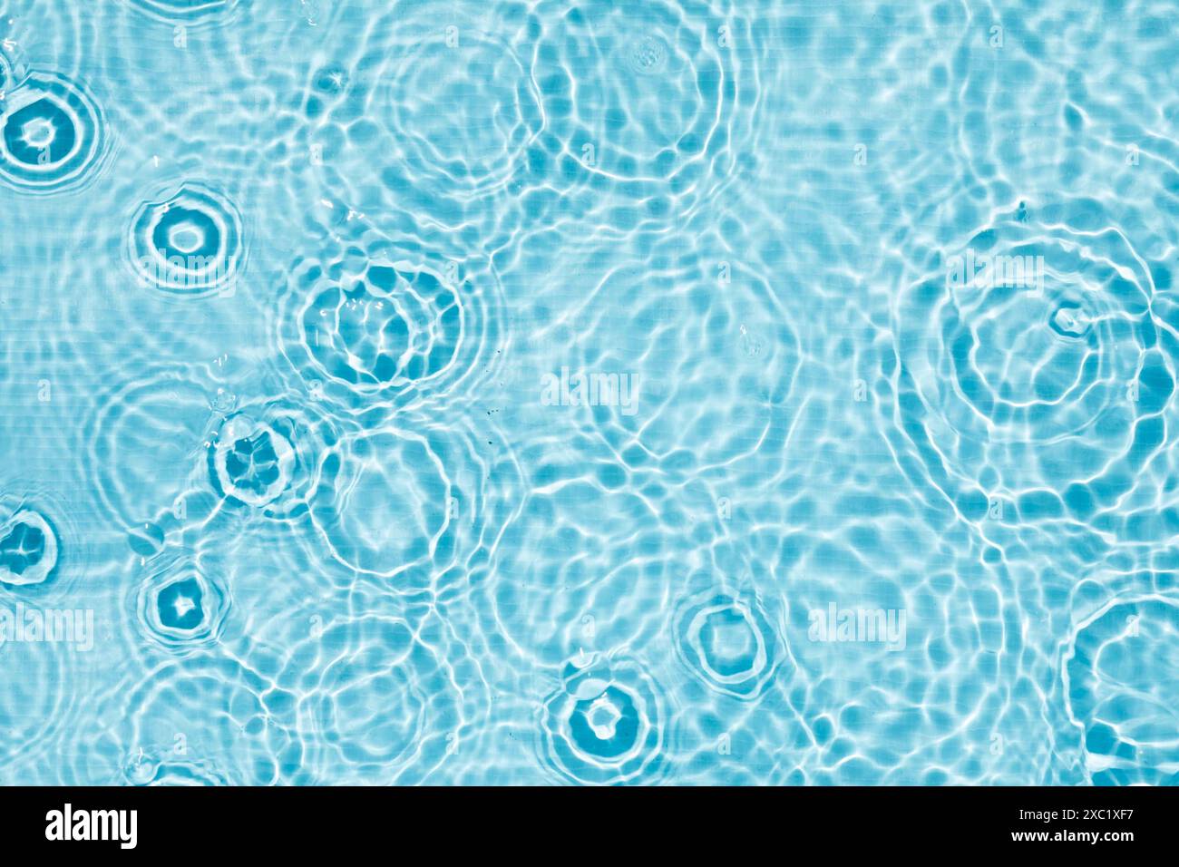 Abstract water, cosmetic background with rings, water surface. Spa ...