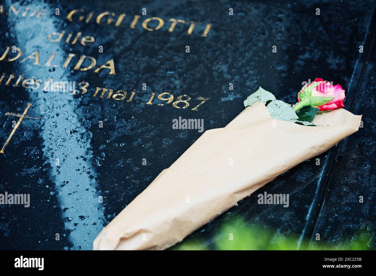 Rain on grave of legendary French singer and actress Dalida (born ...