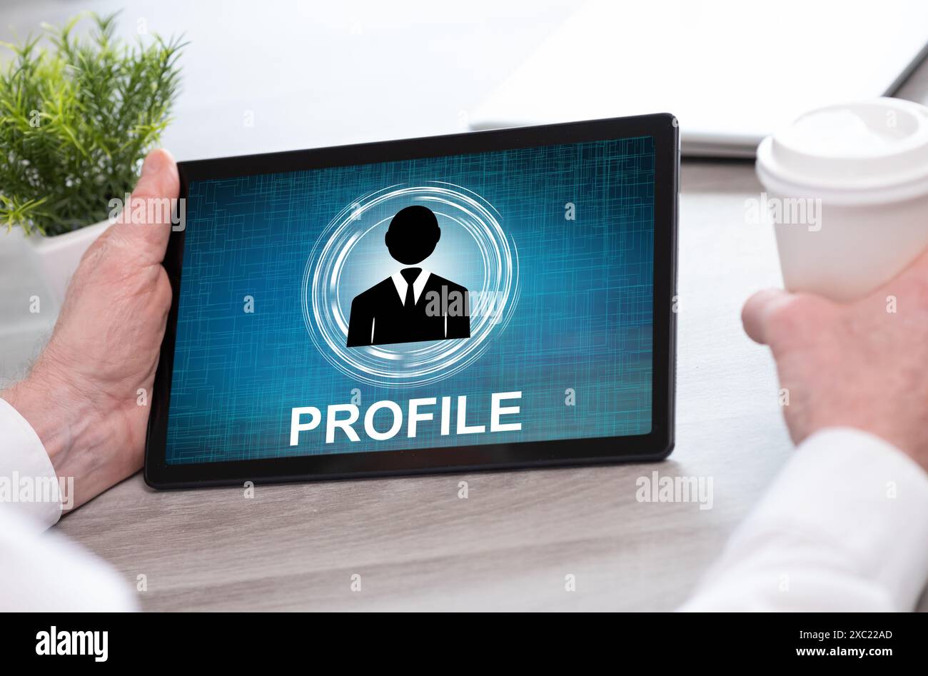 Tablet screen displaying a profile concept Stock Photo - Alamy