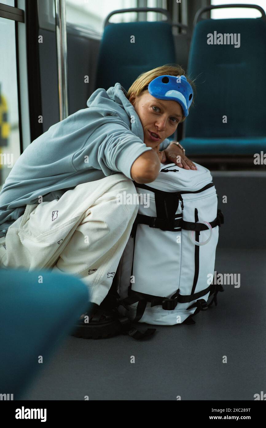 Woman passenger boarding on airplane at airport Stock Photo - Alamy
