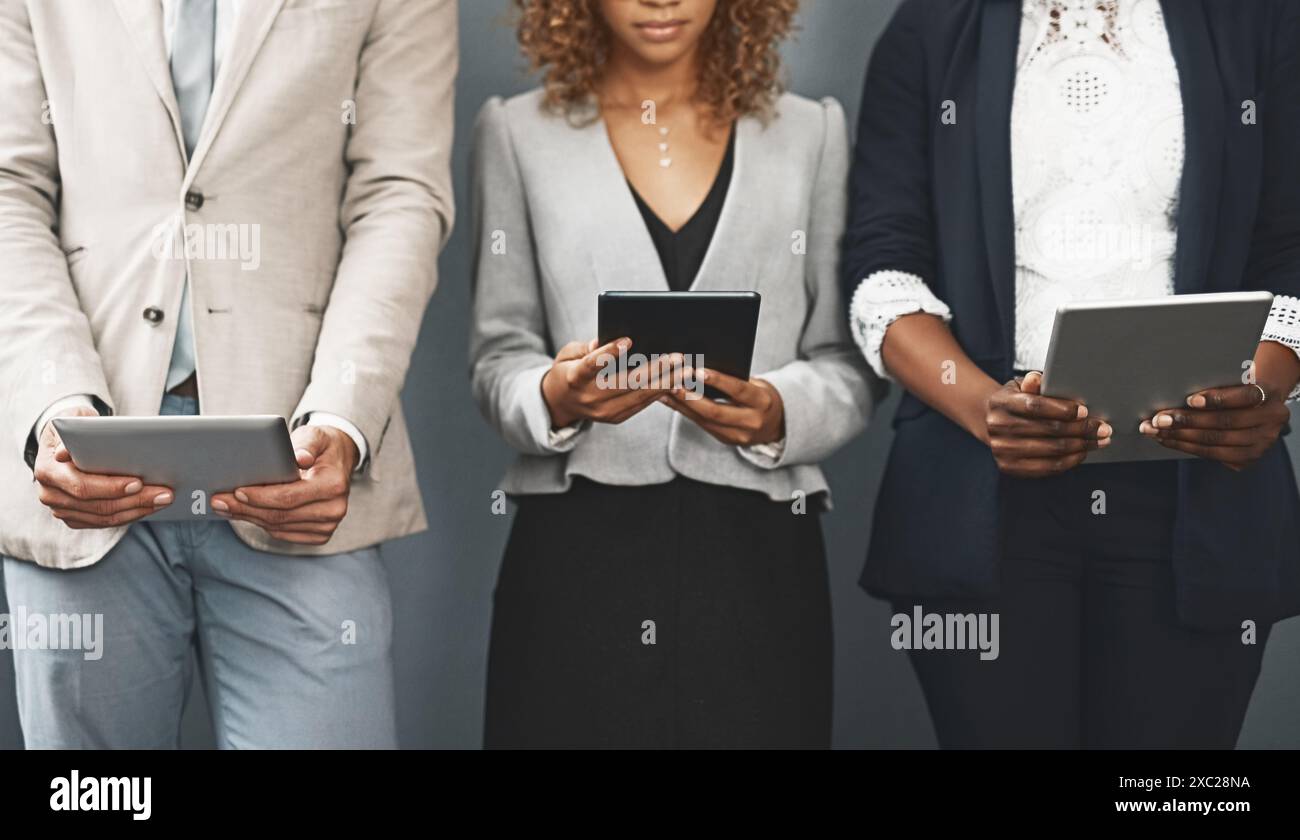 Tablet, team and business people by office wall with line, interview ...