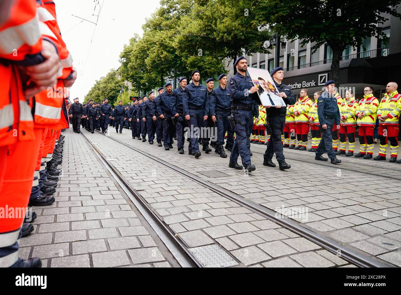 Mannheim, Germany. 14th June, 2024. Police officers walk through the ...