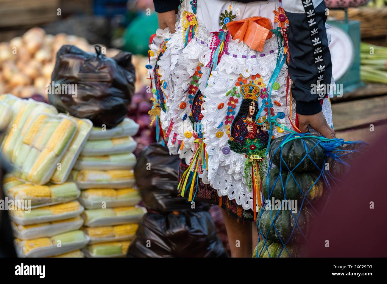 indigenous woman with a skirt of the Virgin Mary Stock Photo - Alamy