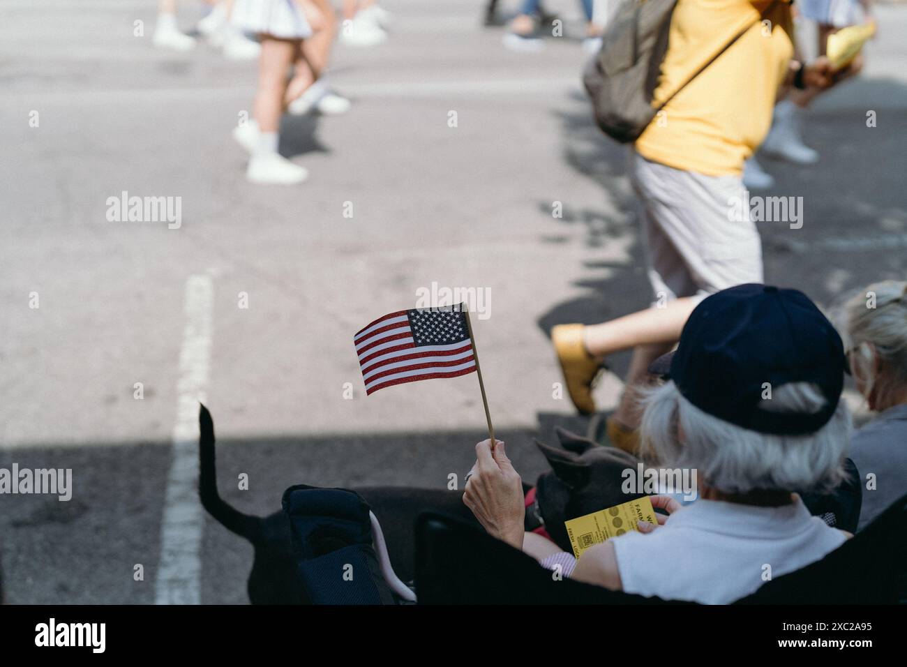 woman waving American flag during 4th of July parade Stock Photo - Alamy