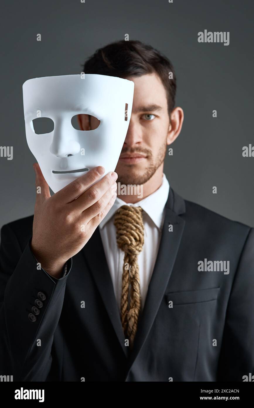 Portrait, business man and mask for secret spy in studio isolated on ...