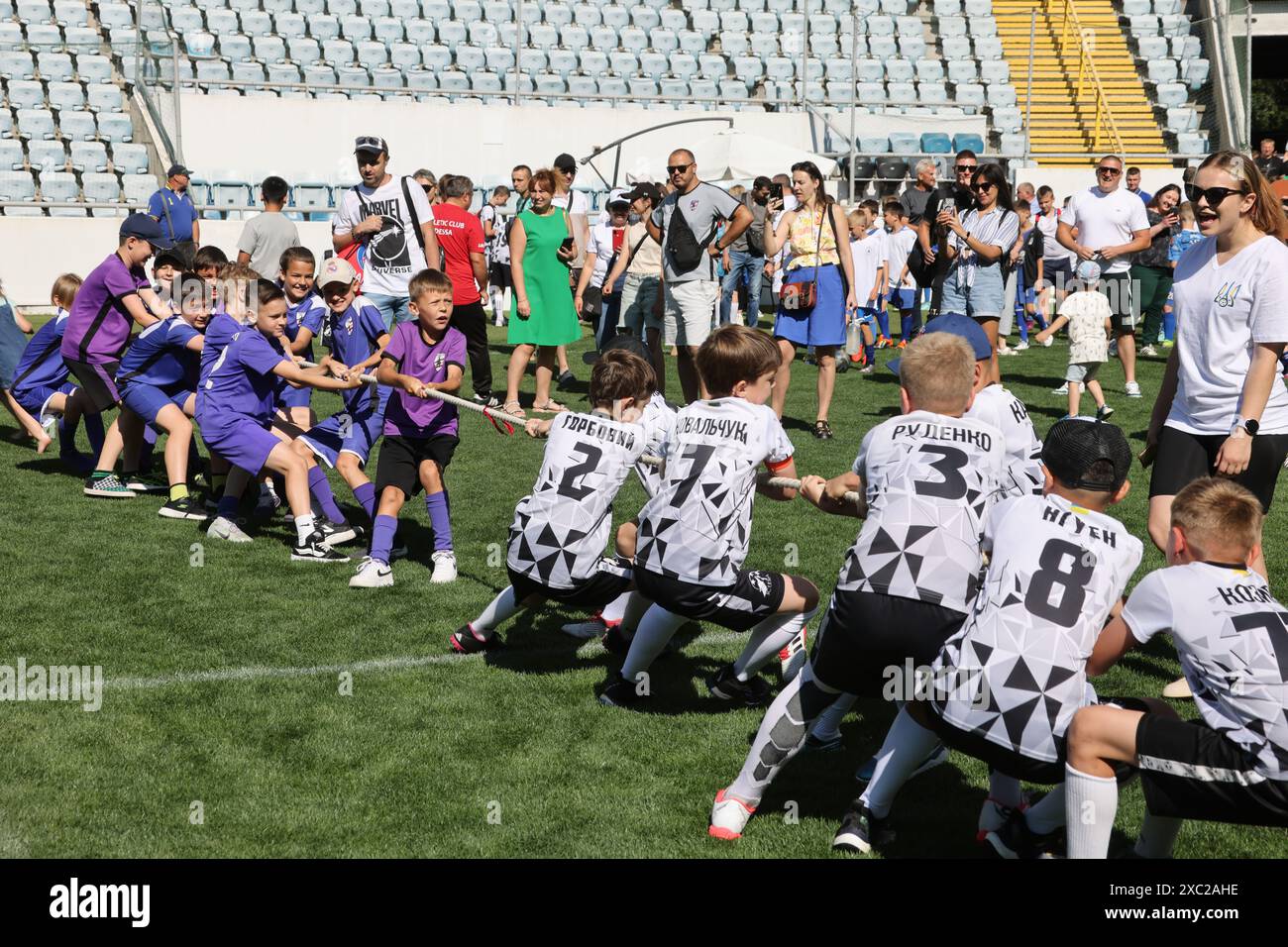 ODESSA, UKRAINE, June 9, 2024: Children's teams play tug of war at ...