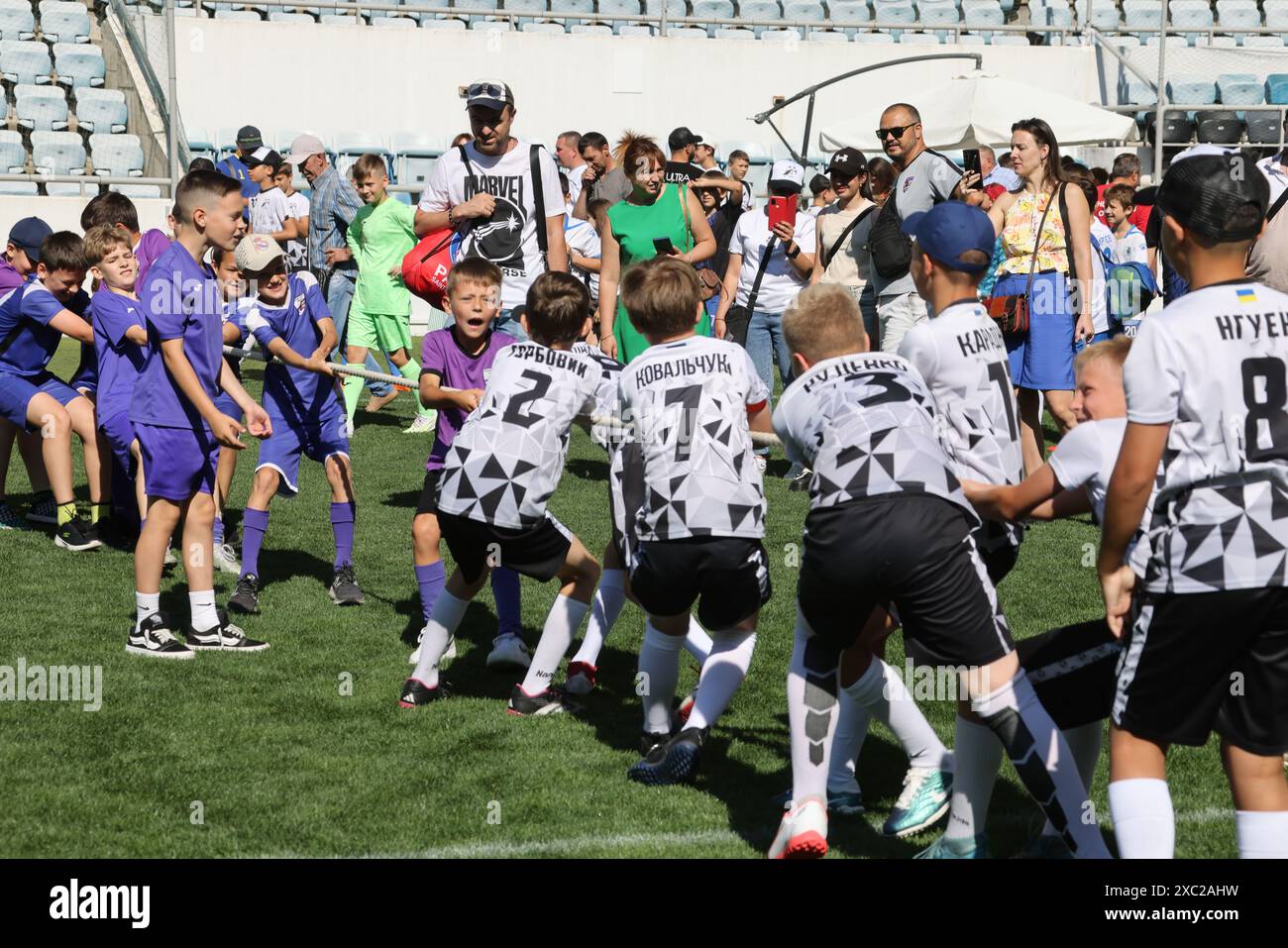 ODESSA, UKRAINE, June 9, 2024: Children's teams play tug of war at ...