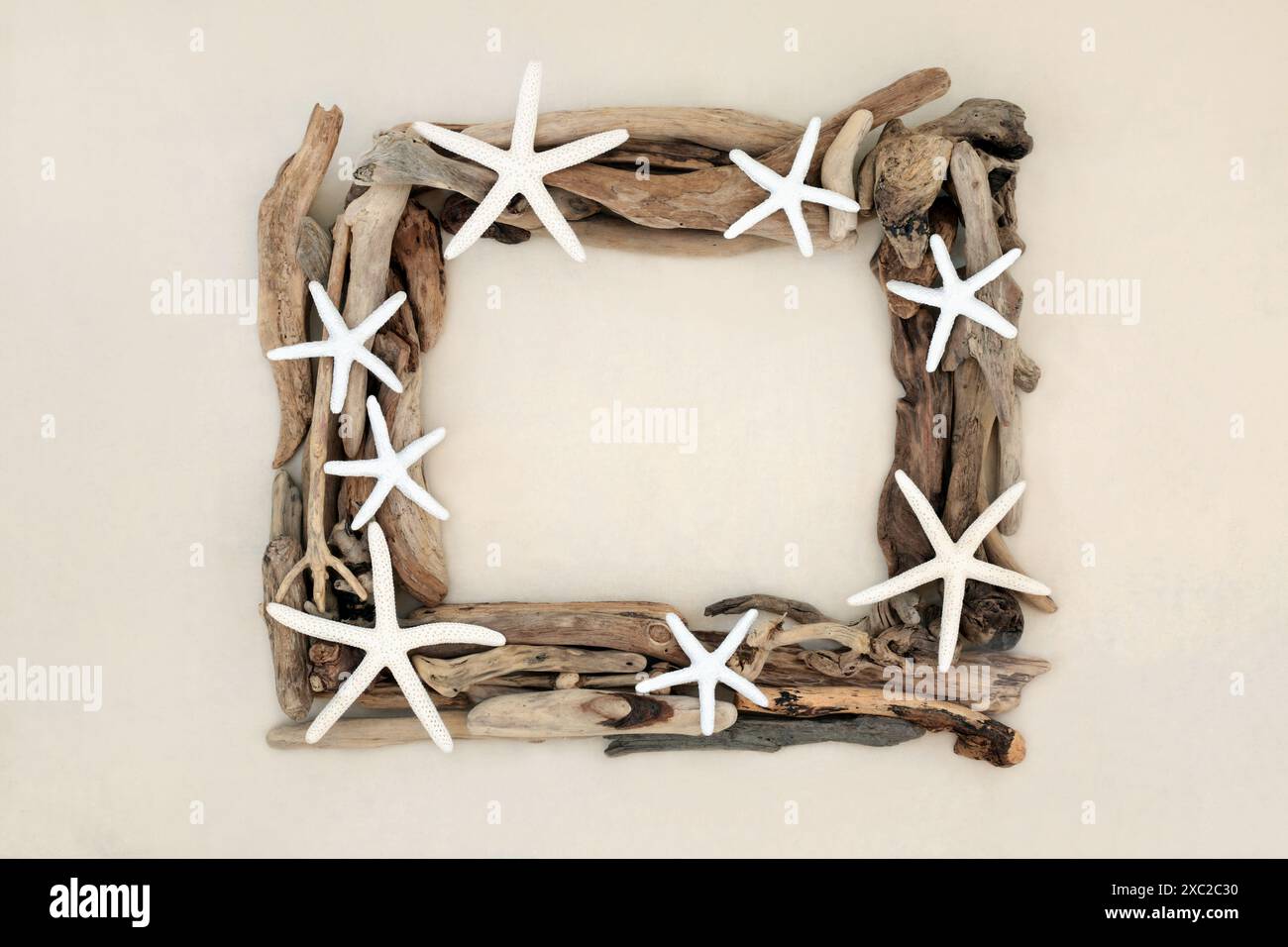 Starfish and driftwood seashell wreath abstract frame on hemp paper ...