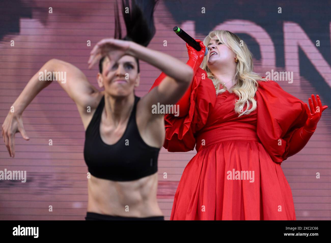 Singer Grace Davies performs before the medal ceremonies of the ...