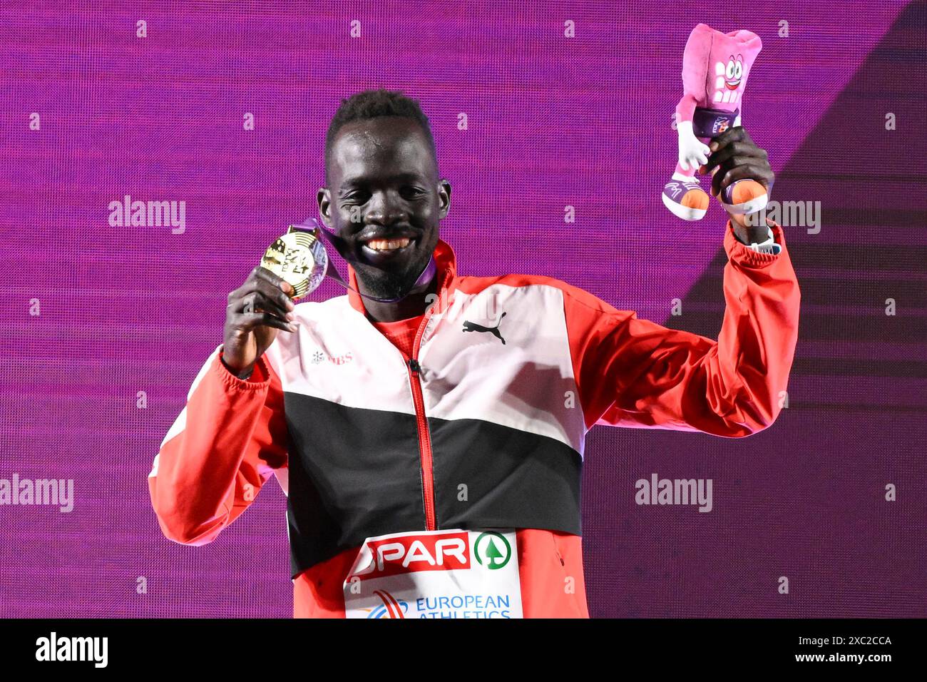 Dominic Lokinyomo Lobalu of Switzerland celebrates during the medal ...