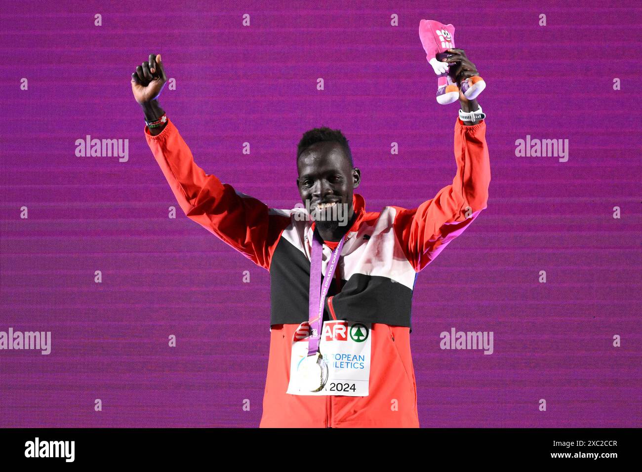 Dominic Lokinyomo Lobalu of Switzerland celebrates during the medal ...