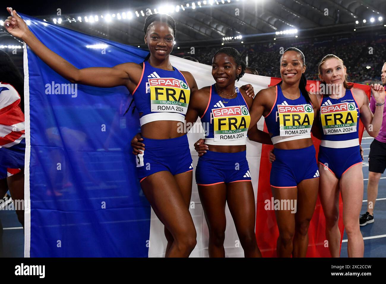 Athletes of team France celebrate after competing in the 4x100m women ...