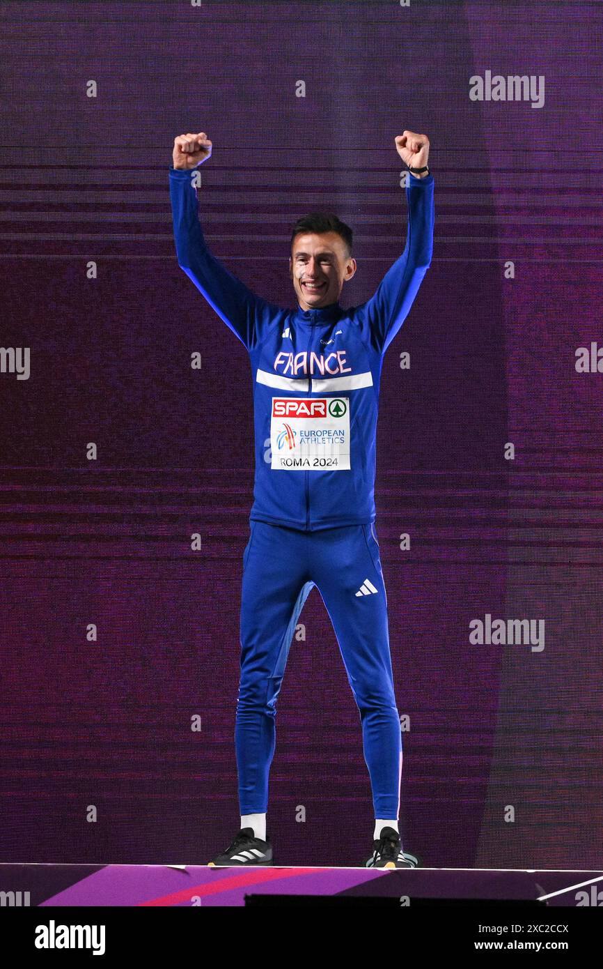 Yann Schrub of France celebrates after competing in the 10000m Men A ...