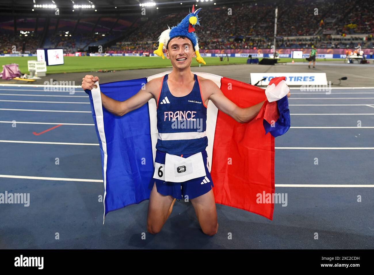 Yann Schrub of France celebrates after competing in the 10000m Men A ...