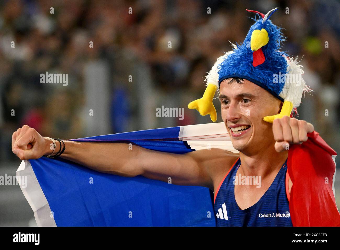 Yann Schrub of France celebrates after competing in the 10000m Men A ...