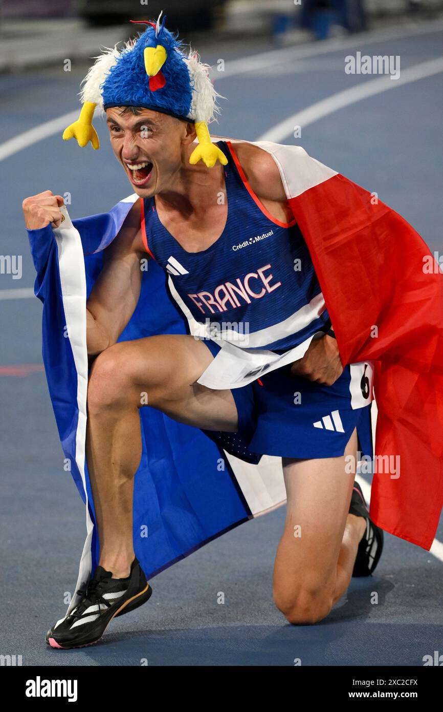 Yann Schrub of France celebrates after competing in the 10000m Men A ...