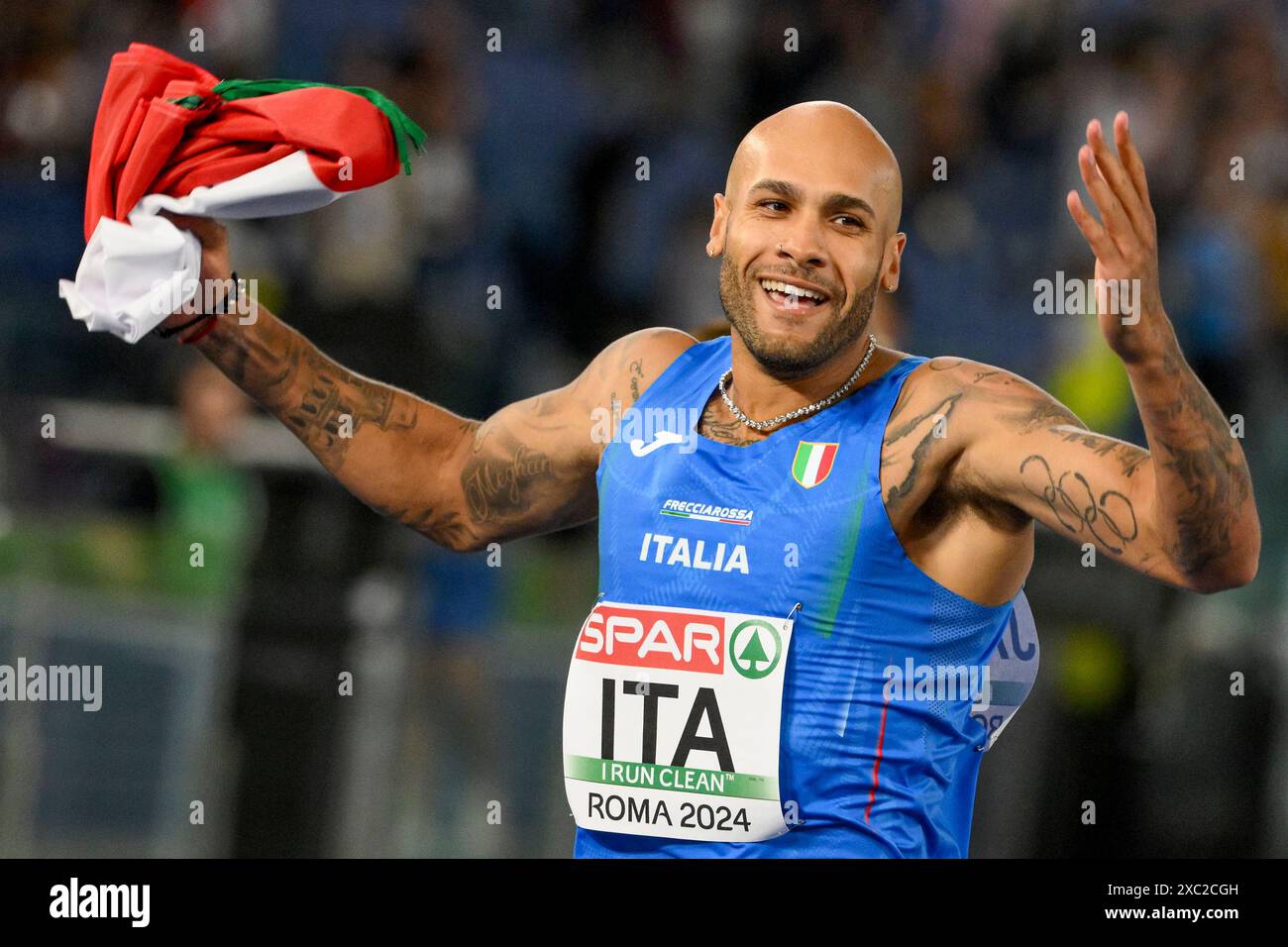 Marcell Jacobs of Italy celebrates after competing in the 4x100m men ...