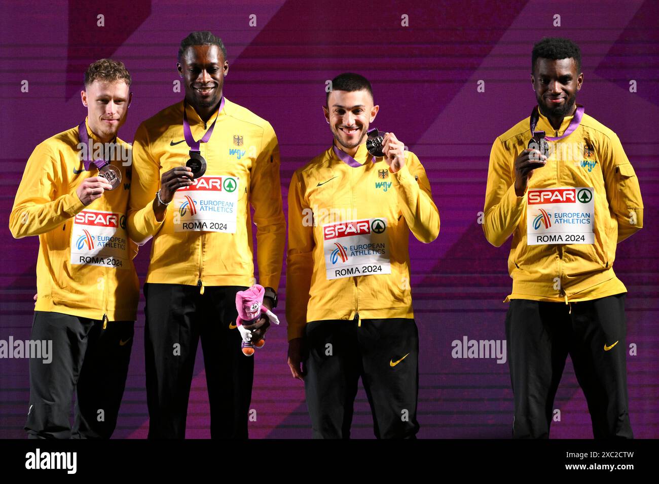 Atheltes of Germany celebrate after competing in the 4x400m relay men ...