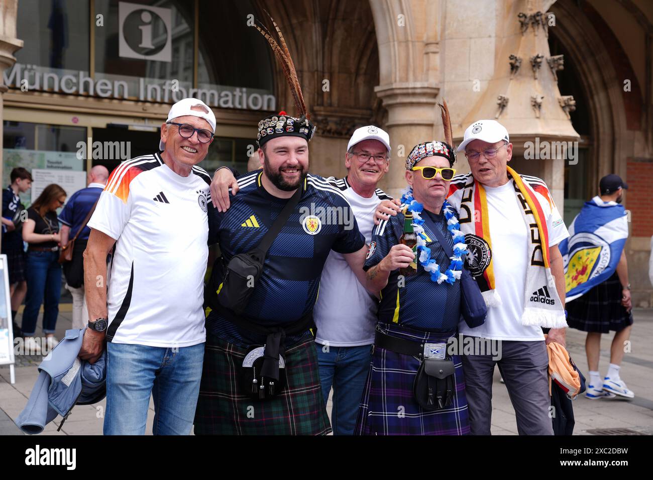 Scotland and Germany fans pose for a photo at Marienplatz square ...