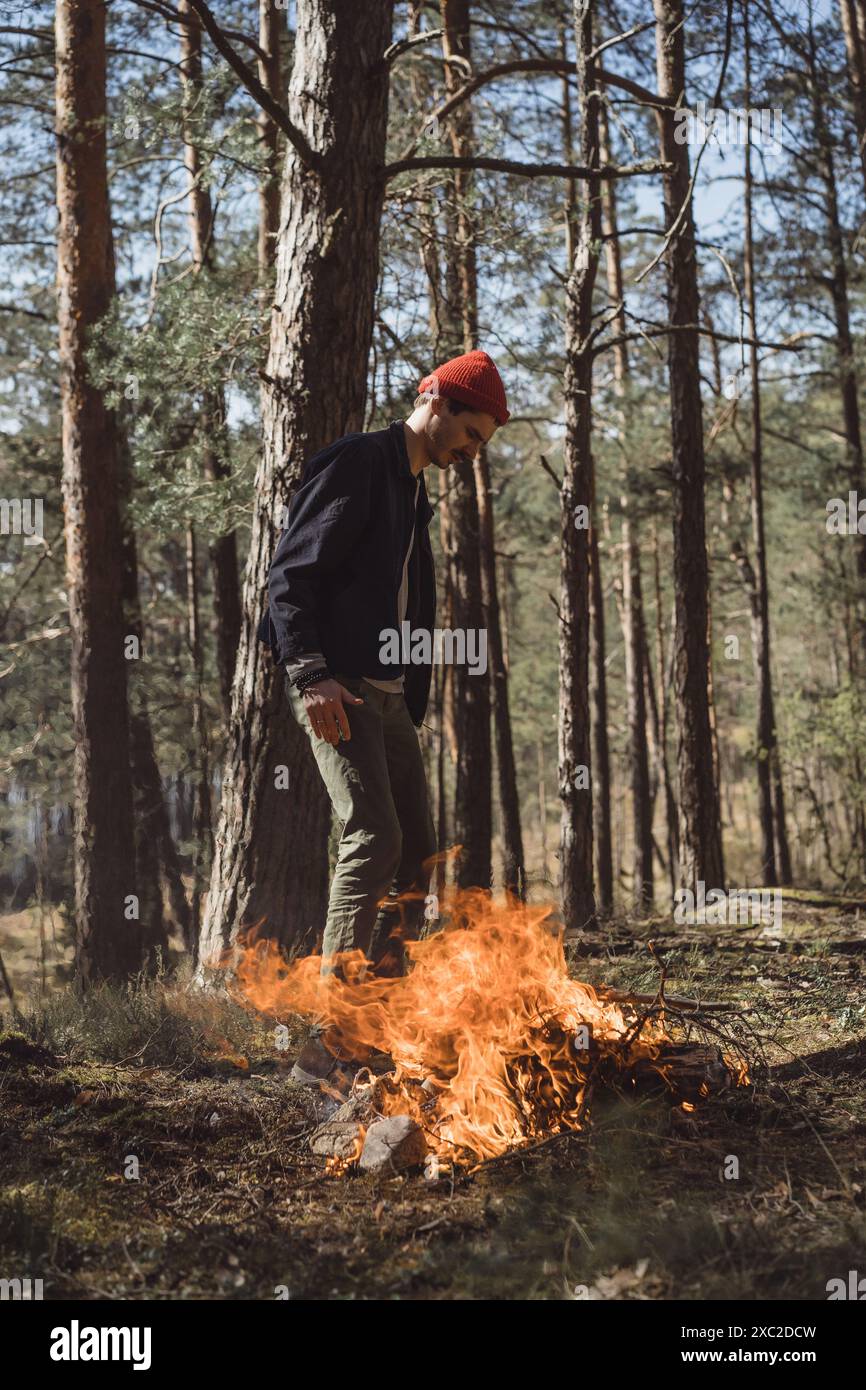 Tourist makes fire in mountains hi-res stock photography and images - Alamy