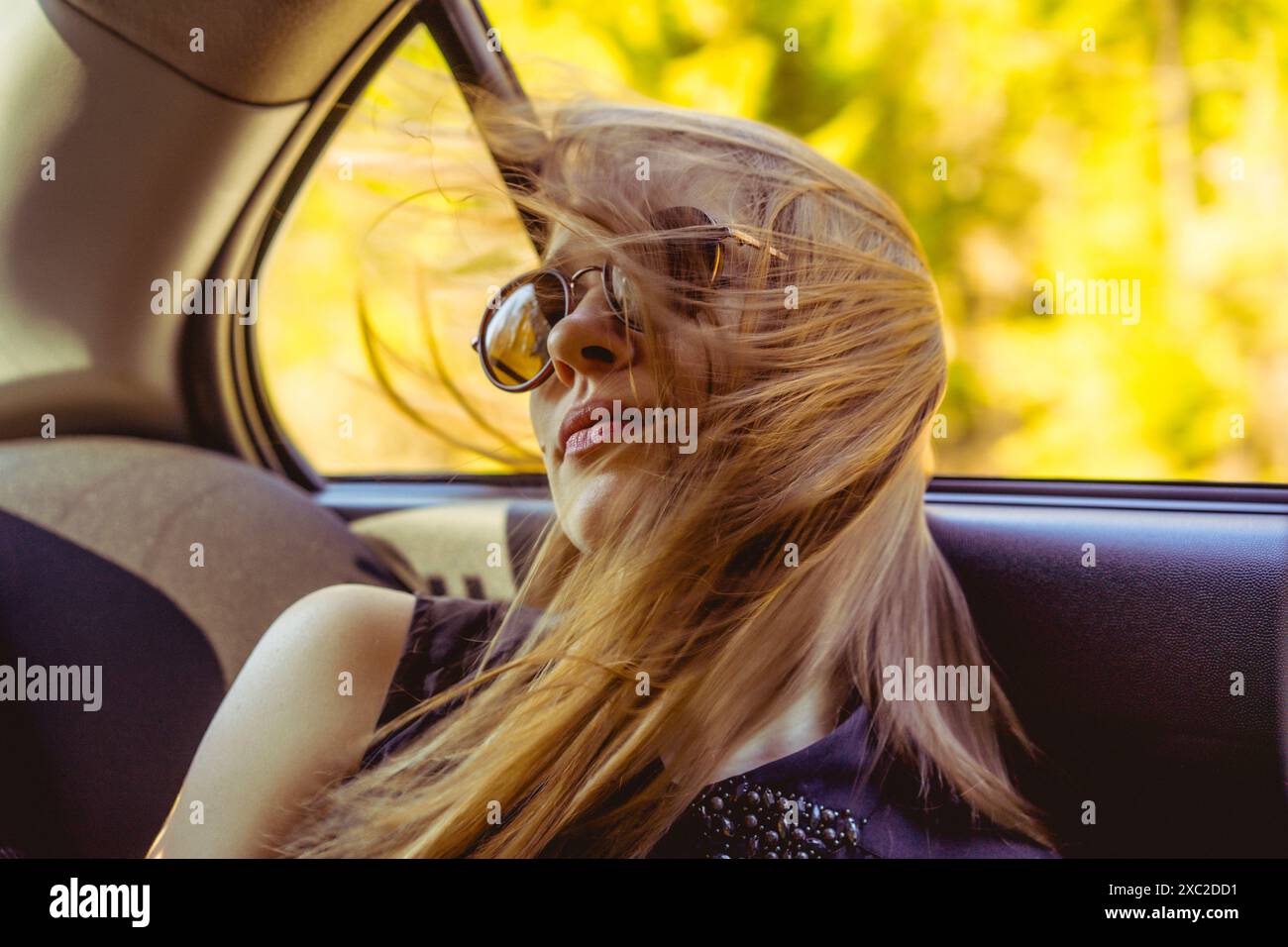Driving with head out window hi-res stock photography and images - Alamy