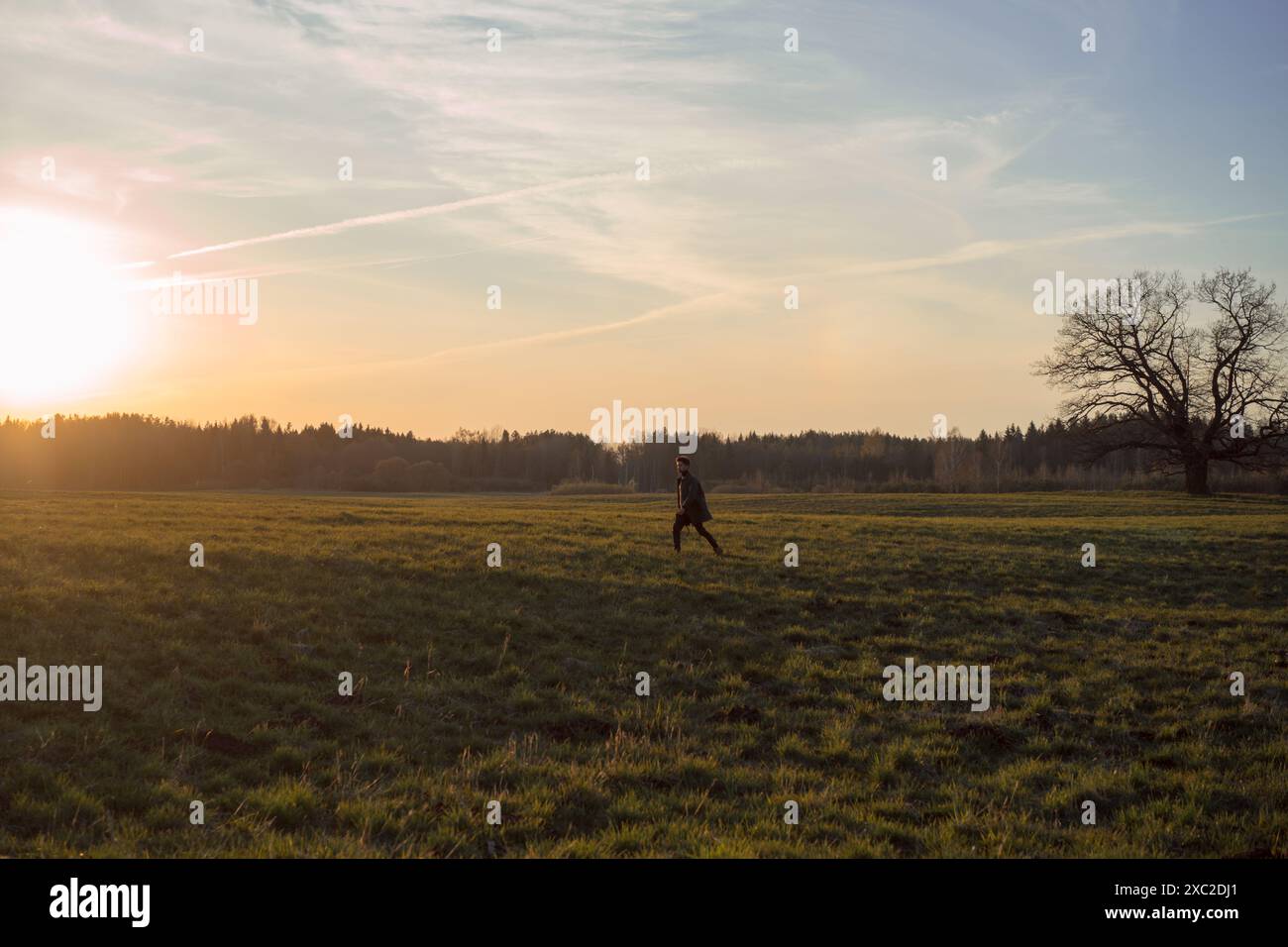 Man farmer walks across field hi-res stock photography and images - Alamy