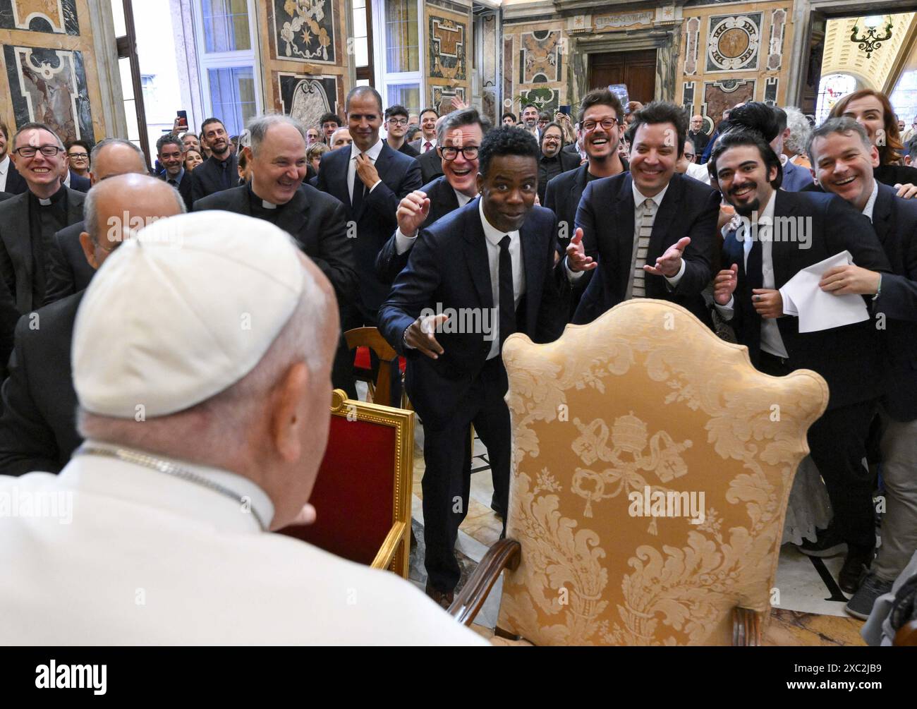 Vatican, June 14, 2024, Pope Francis looks at American comedians Chris ...