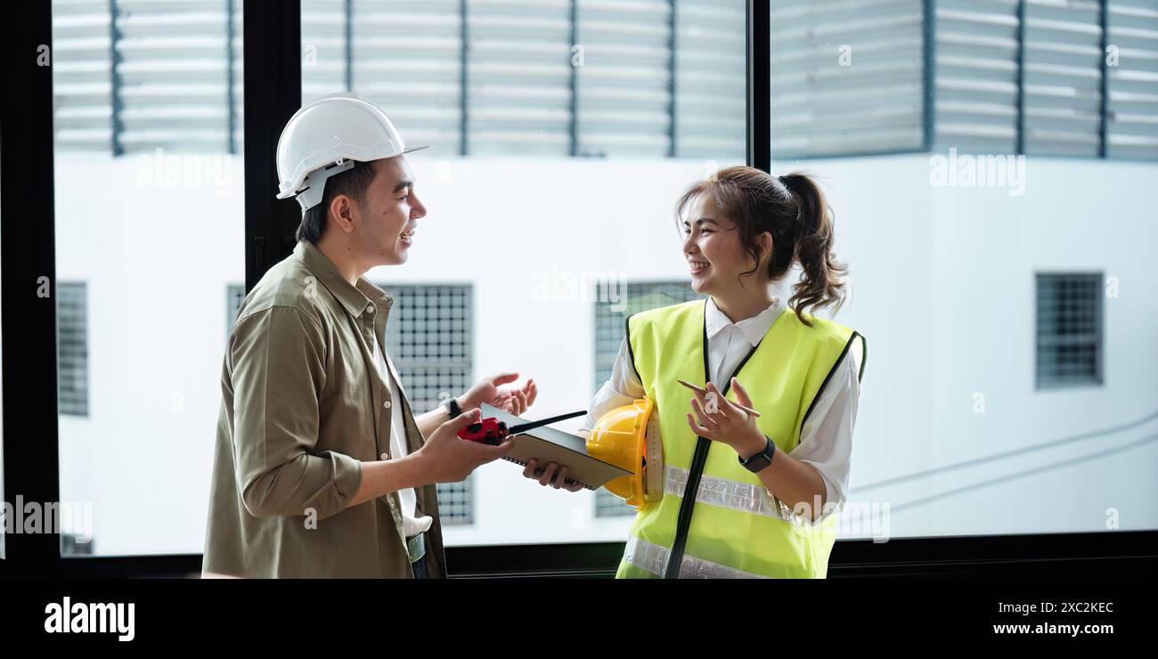 Professional Engineers Collaborating on Construction Project in Modern ...