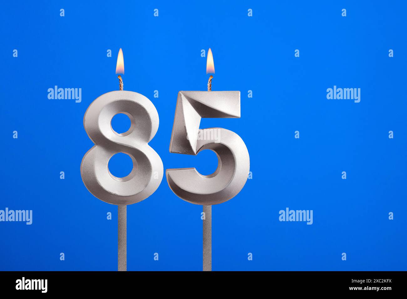 Birthday candle number 85 - Celebration card on blue background Stock ...