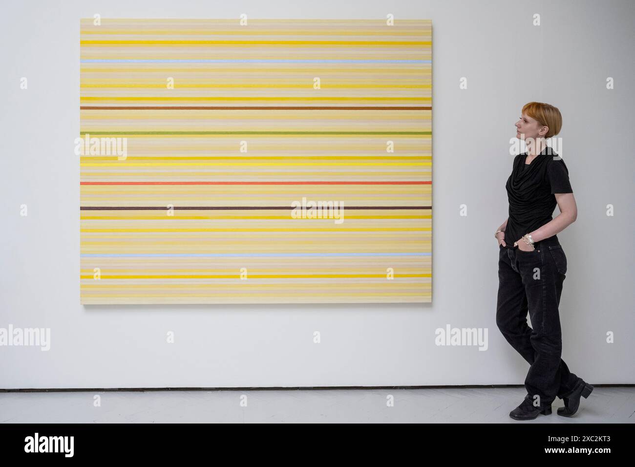 London, UK. 14 June 2024. A staff member with works, 2024, by Fleur ...